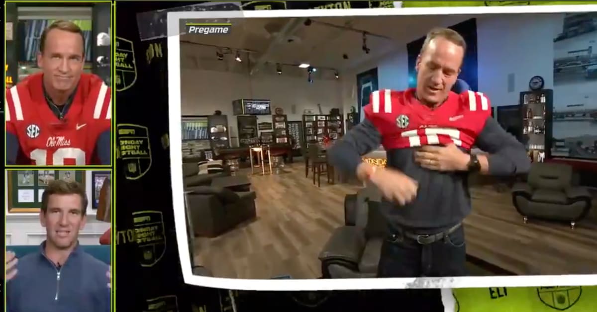 Manning Cast: Peyton wears Eli's Ole Miss jersey after losing bet ...