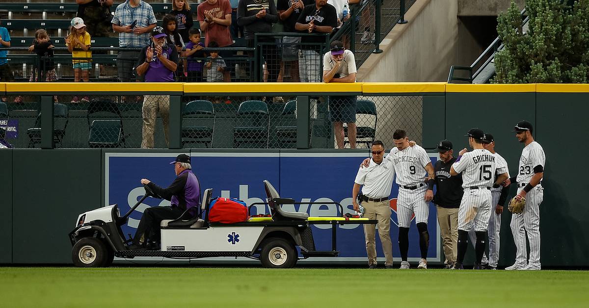 Rockies’ Brenton Doyle Carted Off With Injury After Crashing Into ...
