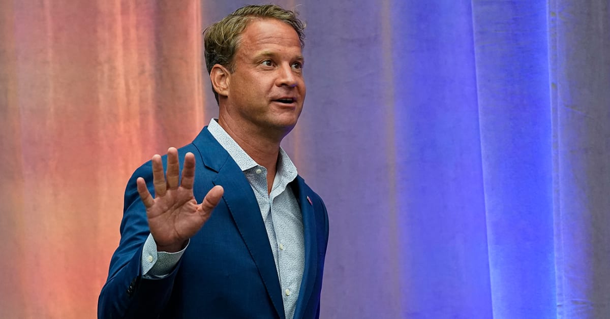 Lane Kiffin Signs Mustard Bottle, Homage to Tennessee–Ole Miss Showdown ...