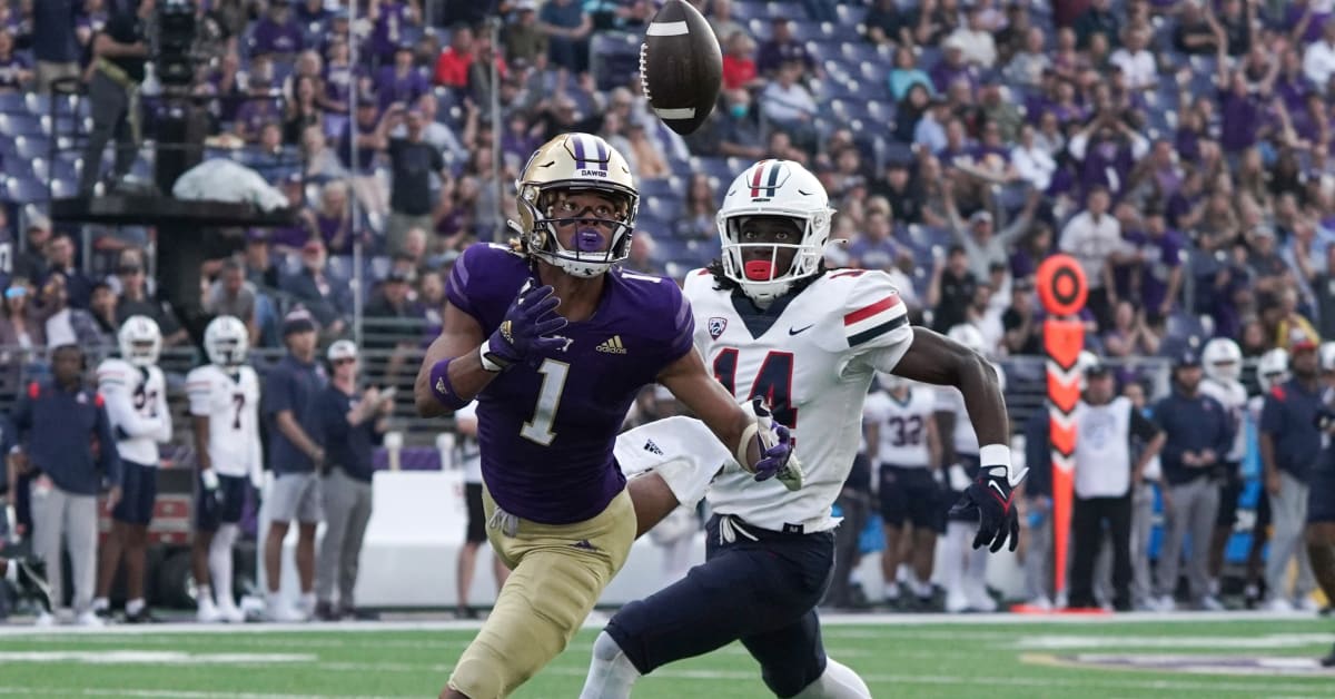 Rome Odunze's Juggling Act Helps Huskies Go for the Jugular - Sports ...