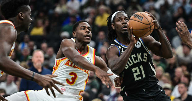 Jrue Holiday relishes playing against brothers Justin and Aaron in the ...