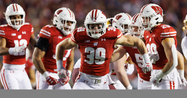 Wisconsin to play in the Guaranteed Rate Bowl against Oklahoma State ...