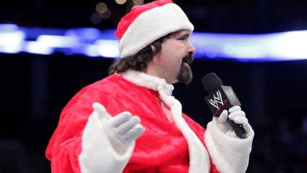 WWE Raw: Mick Foley loses HIAC tooth (video) - Sports Illustrated