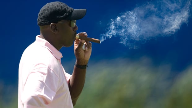 Michael Jordan double-fists cigars at Ryder Cup - Sports Illustrated