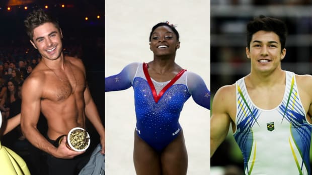 Simone Biles standing next to Shaq (Photo) - Sports Illustrated