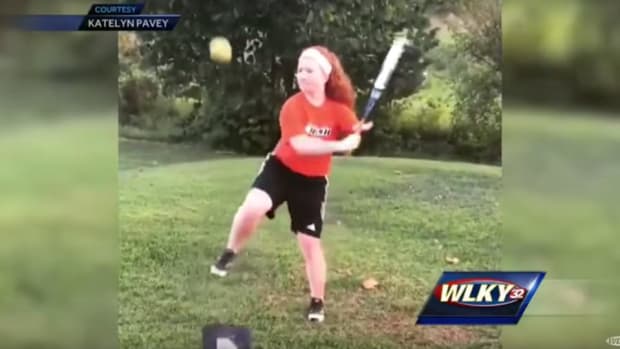 Incredible baseball bat trick swing - Sports Illustrated