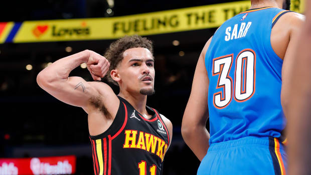 Watch Trae Young Throw Alley-Oop Dunk to Himself - Sports Illustrated ...