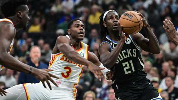 Jrue Holiday relishes playing against brothers Justin and Aaron in the ...