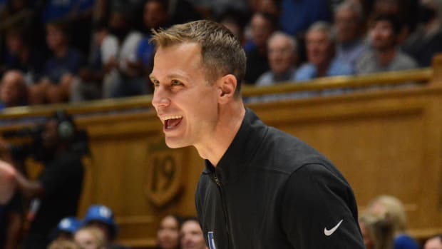 Undefeated Duke basketball head coach gets cold water bath - Sports ...