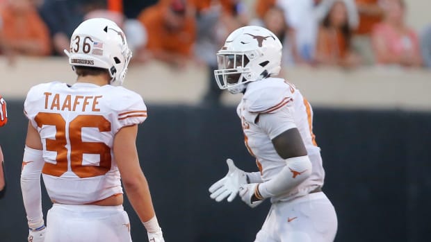 WATCH: Texas Longhorns Safety Michael Taaffe Makes Circus INT vs ...