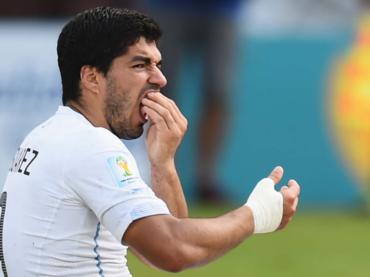 luis suarez son biting