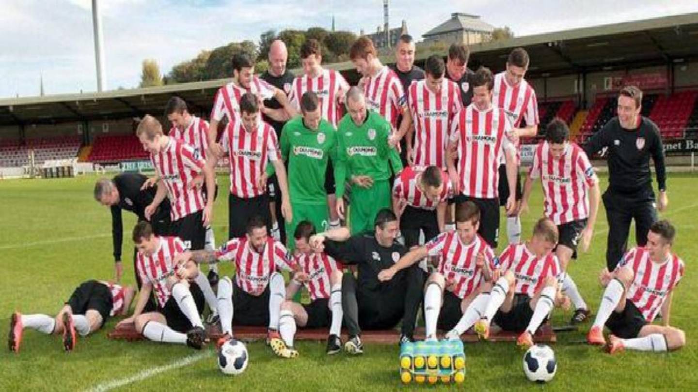 Perfectly timed soccer team photo captures bench collapse