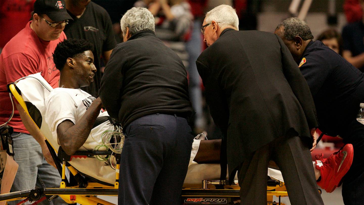 San Diego State F Dwayne Polee visits practice after collapse