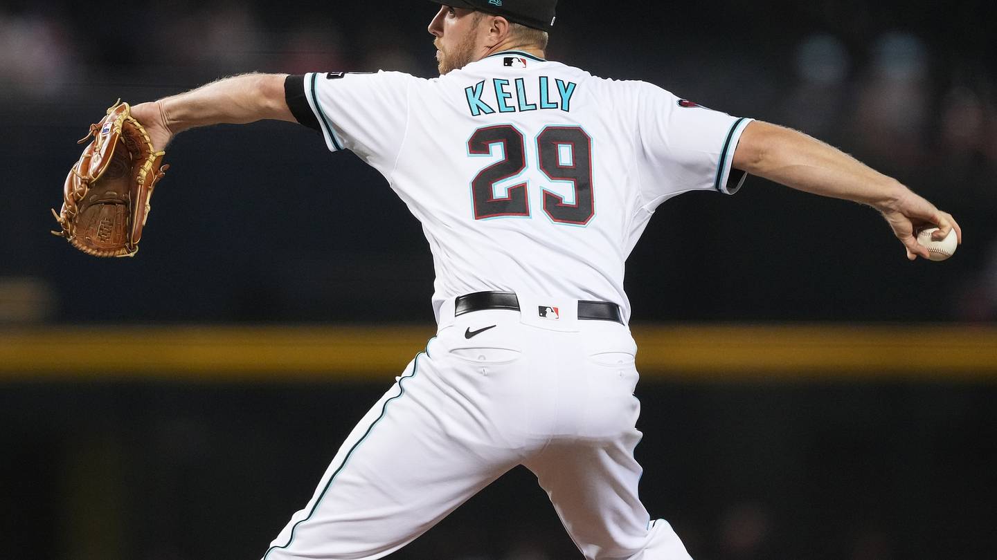 Arizona Diamondbacks Pitcher Merrill Kelly Now Stands Beside Randy ...