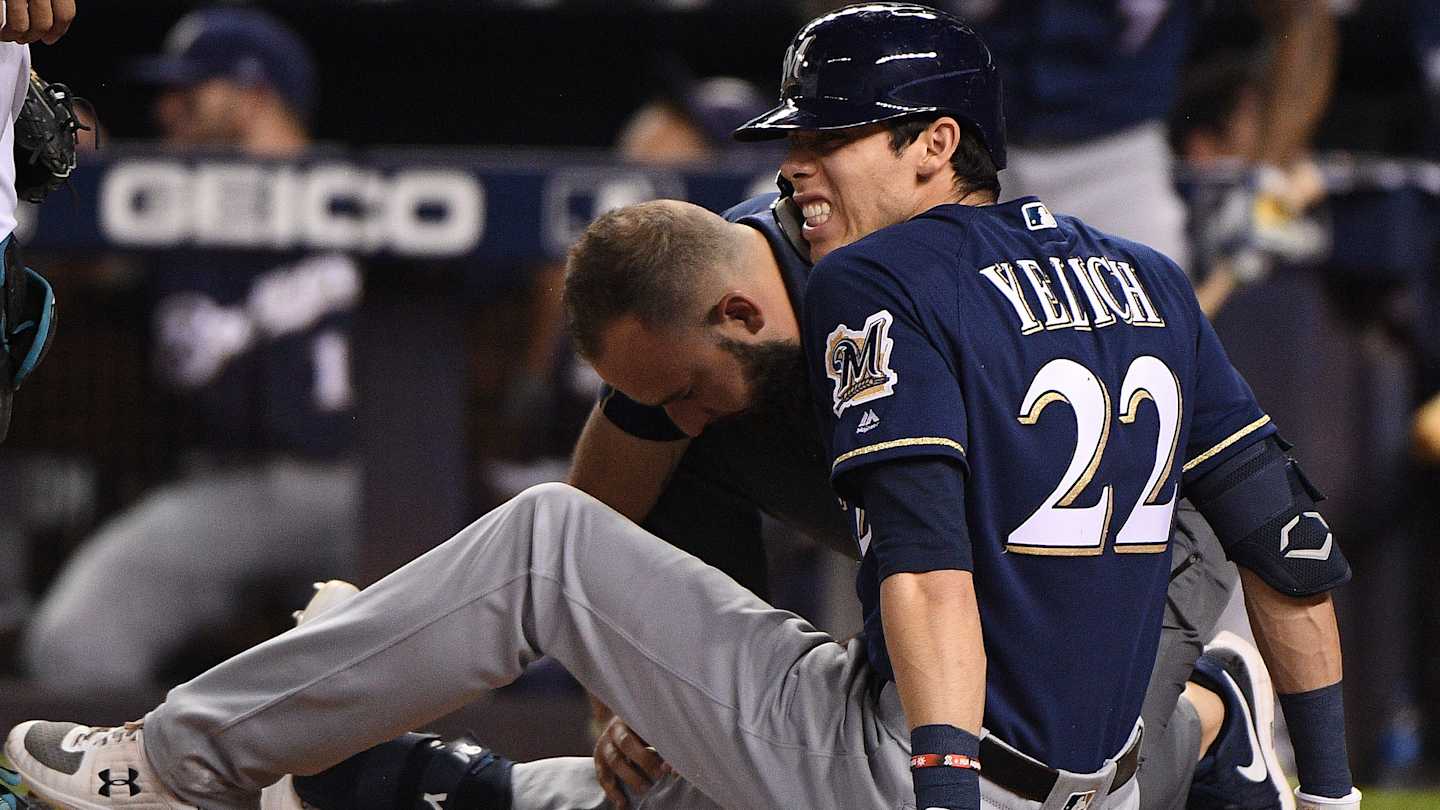 Christian Yelich won't require surgery on fractured kneecap - Sports ...