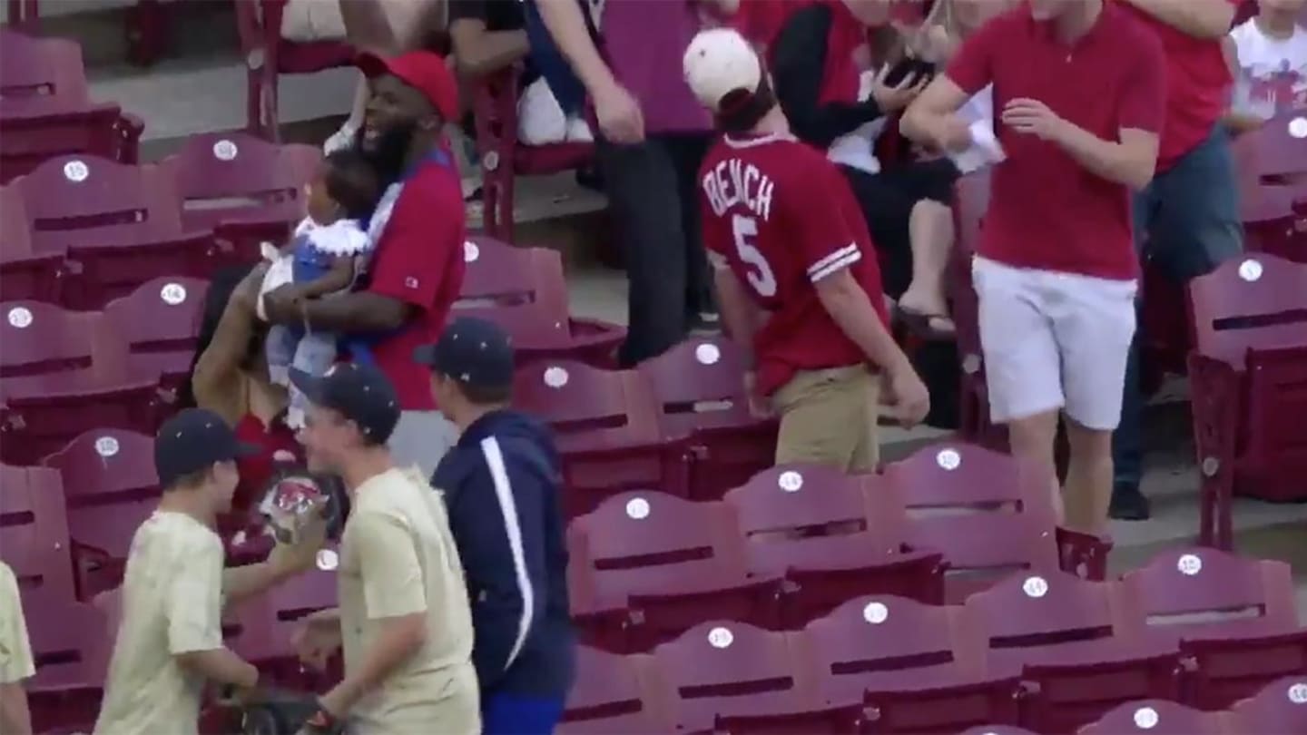Fan grabs foul ball baby video: Fan reached backwards for catch ...