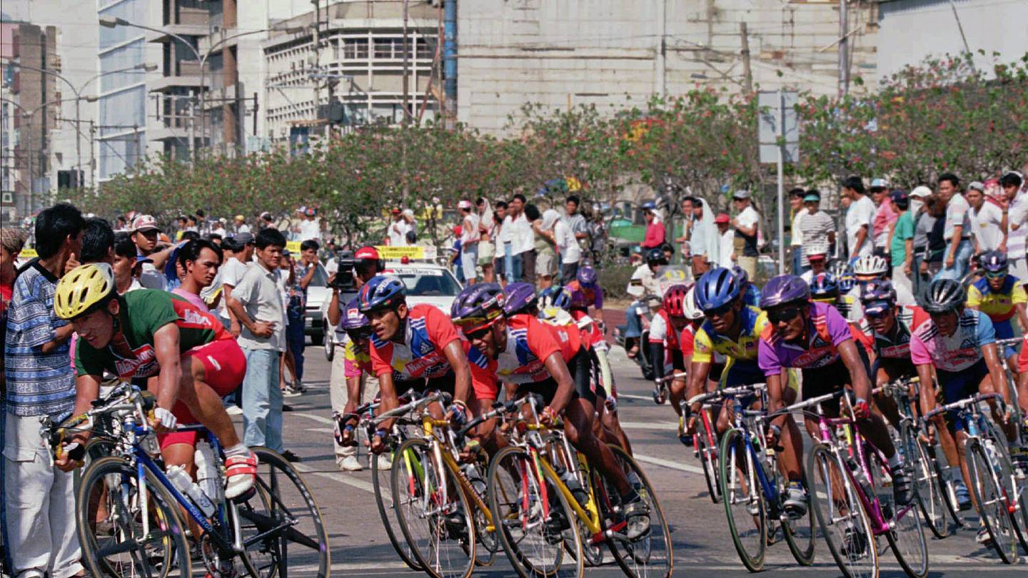 Cyclists forced to ride into oncoming traffic as parked cars block ...