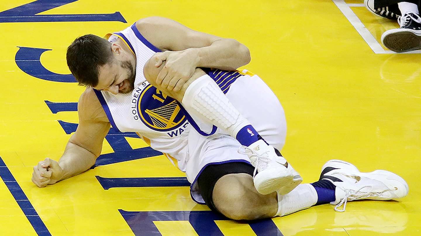 Warriors: Andrew Bogut injures leg against Cavs - Sports Illustrated