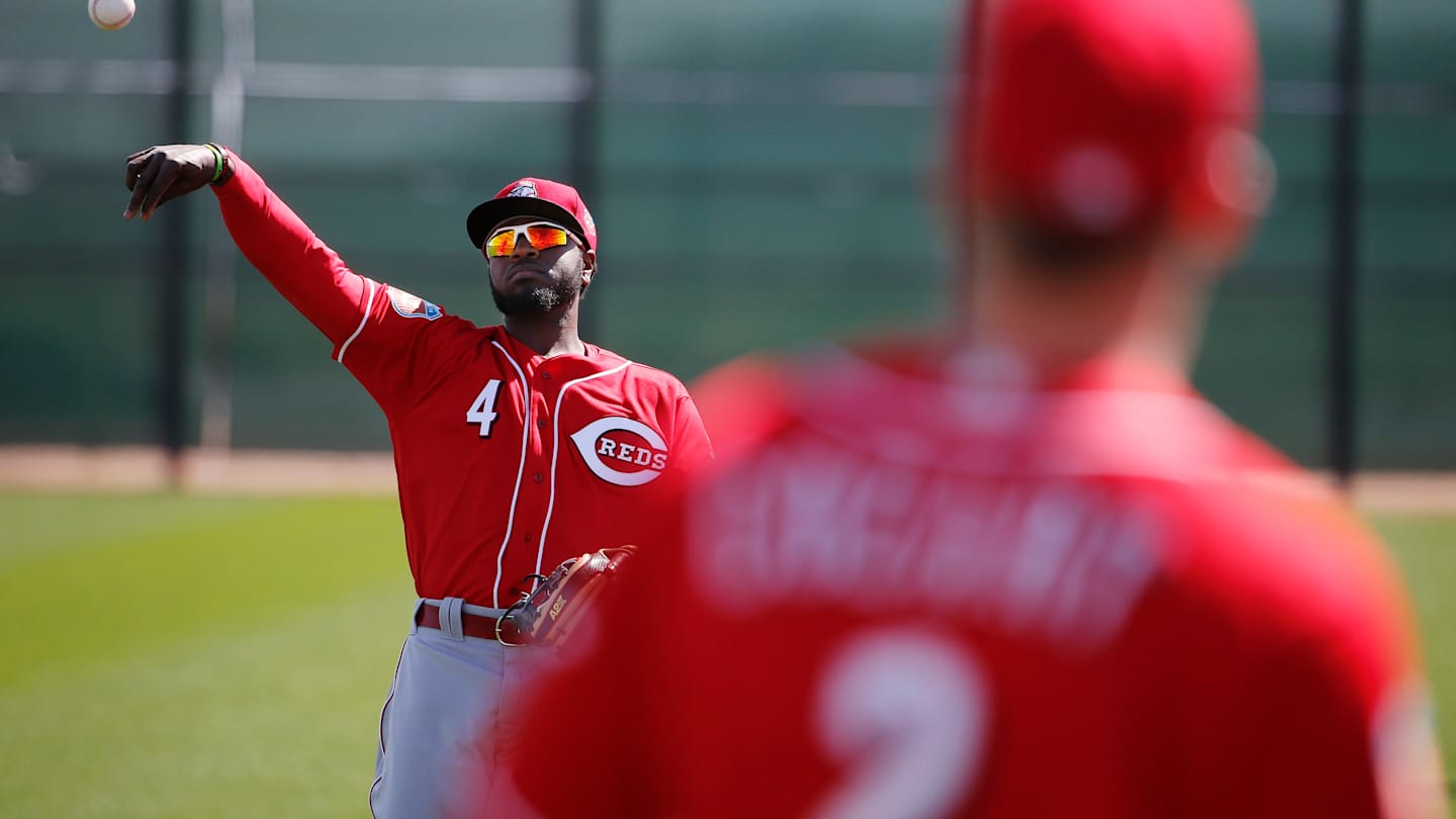 Despite offseason deals, Reds' Phillips back for 11th year - Sports ...