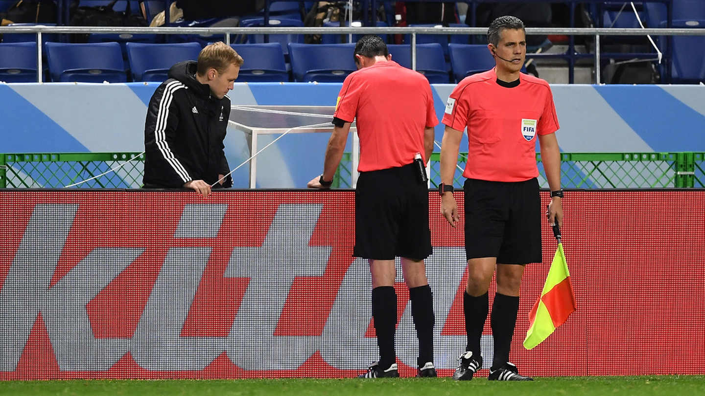 Watch: Video Assistant Referees make FIFA debut - Sports Illustrated