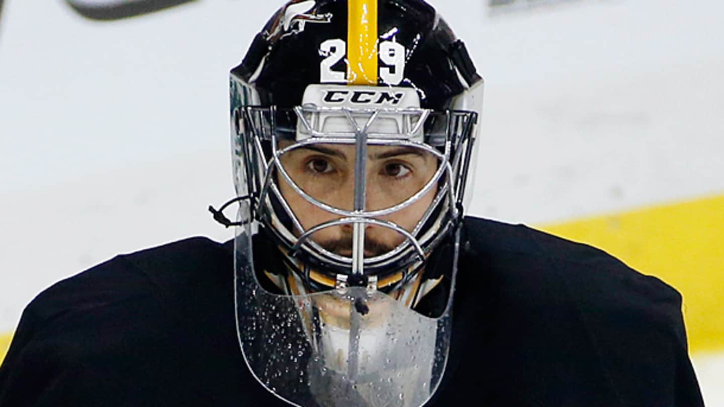 Pens’ Fleury leaves briefly after taking skate to chin - Sports Illustrated