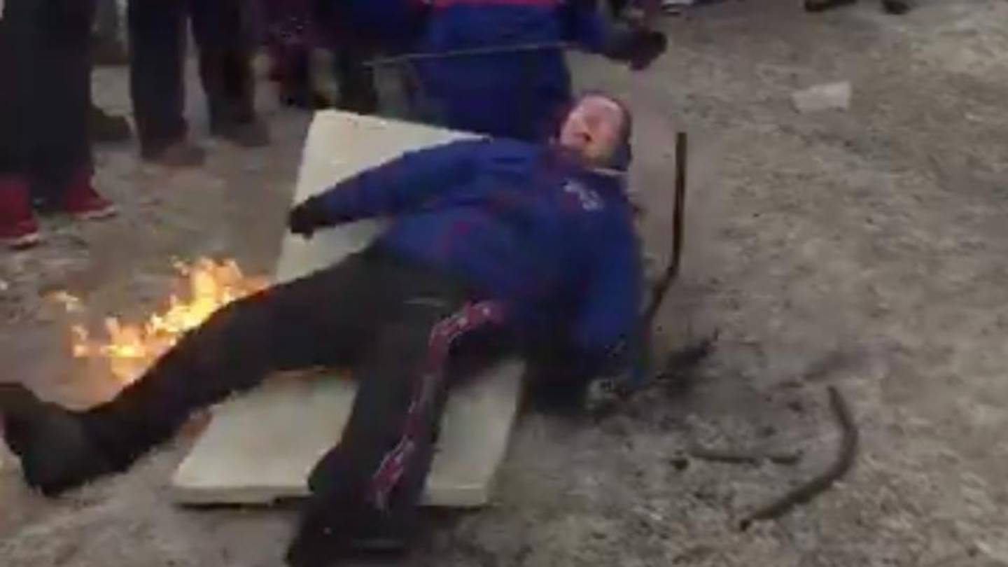 Video: Buffalo Bills fan tailgate features fire, broken tables - Sports ...