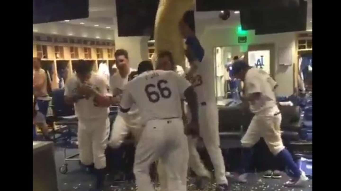 Video: Dodgers do running man challenge with bag of popcorn - Sports ...