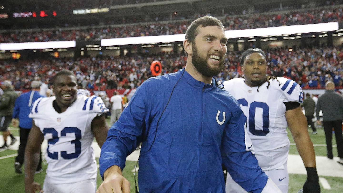 Luck goes through quarterback drills during Colts' practice - Sports ...