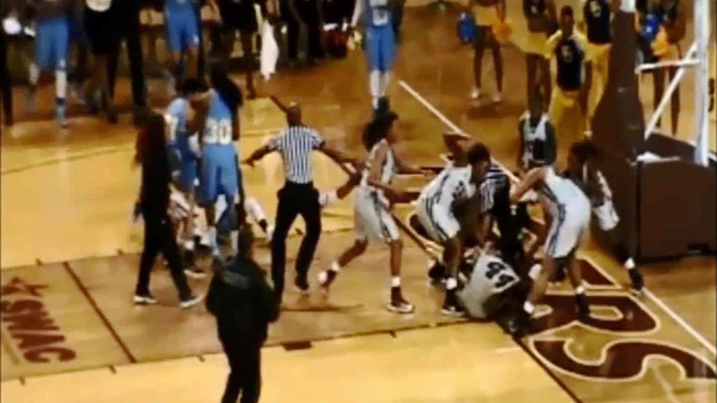 Massive women's college basketball brawl leads to 15 suspensions ...