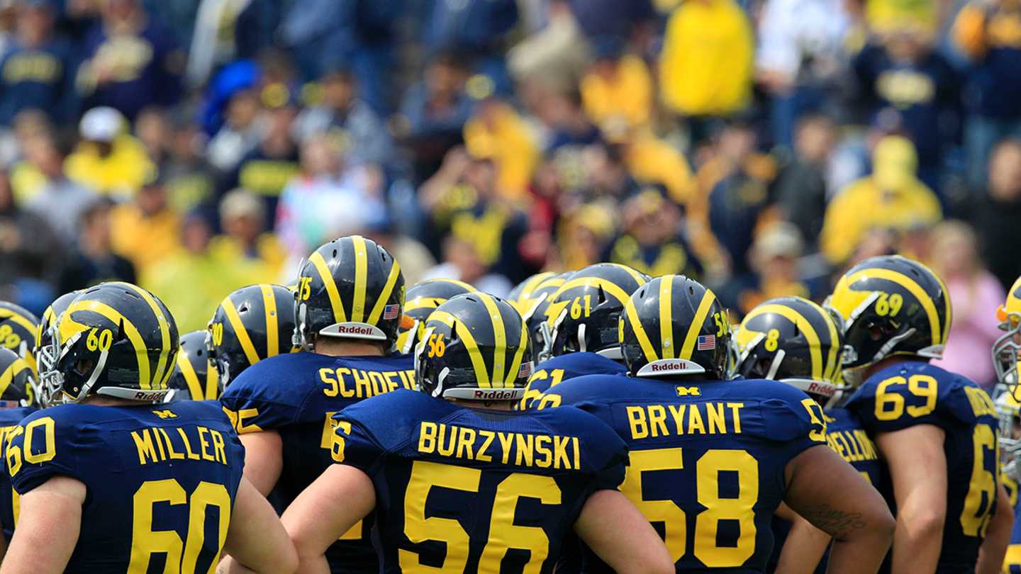 University of Michigan football players flip - Sports Illustrated