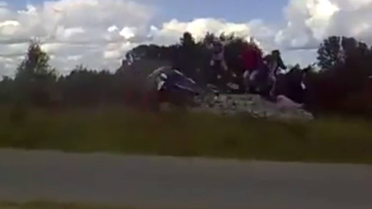 Rally car accident in Poland comes inches from spectators after ...