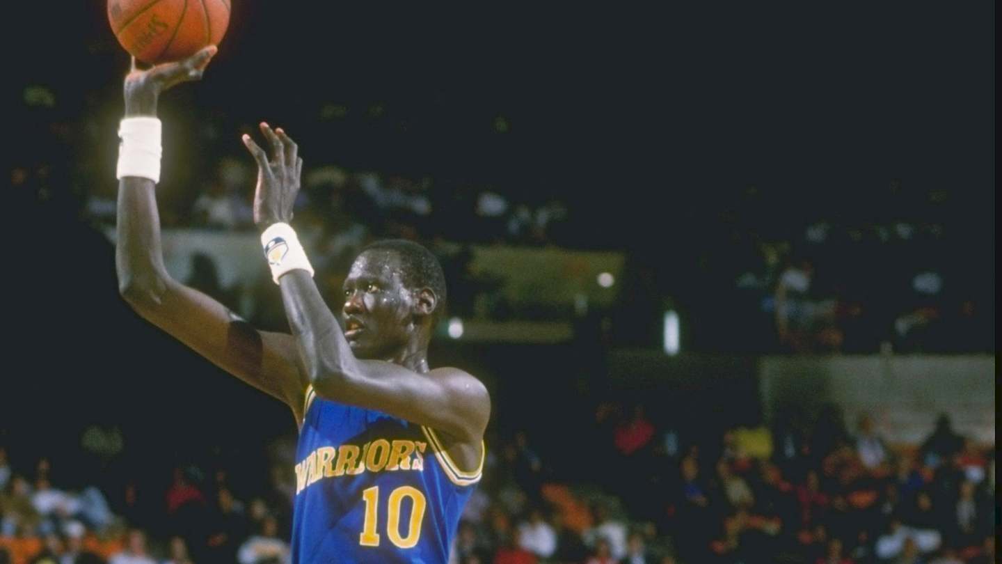 #tbt: Manute Bol was very, very tall - Sports Illustrated