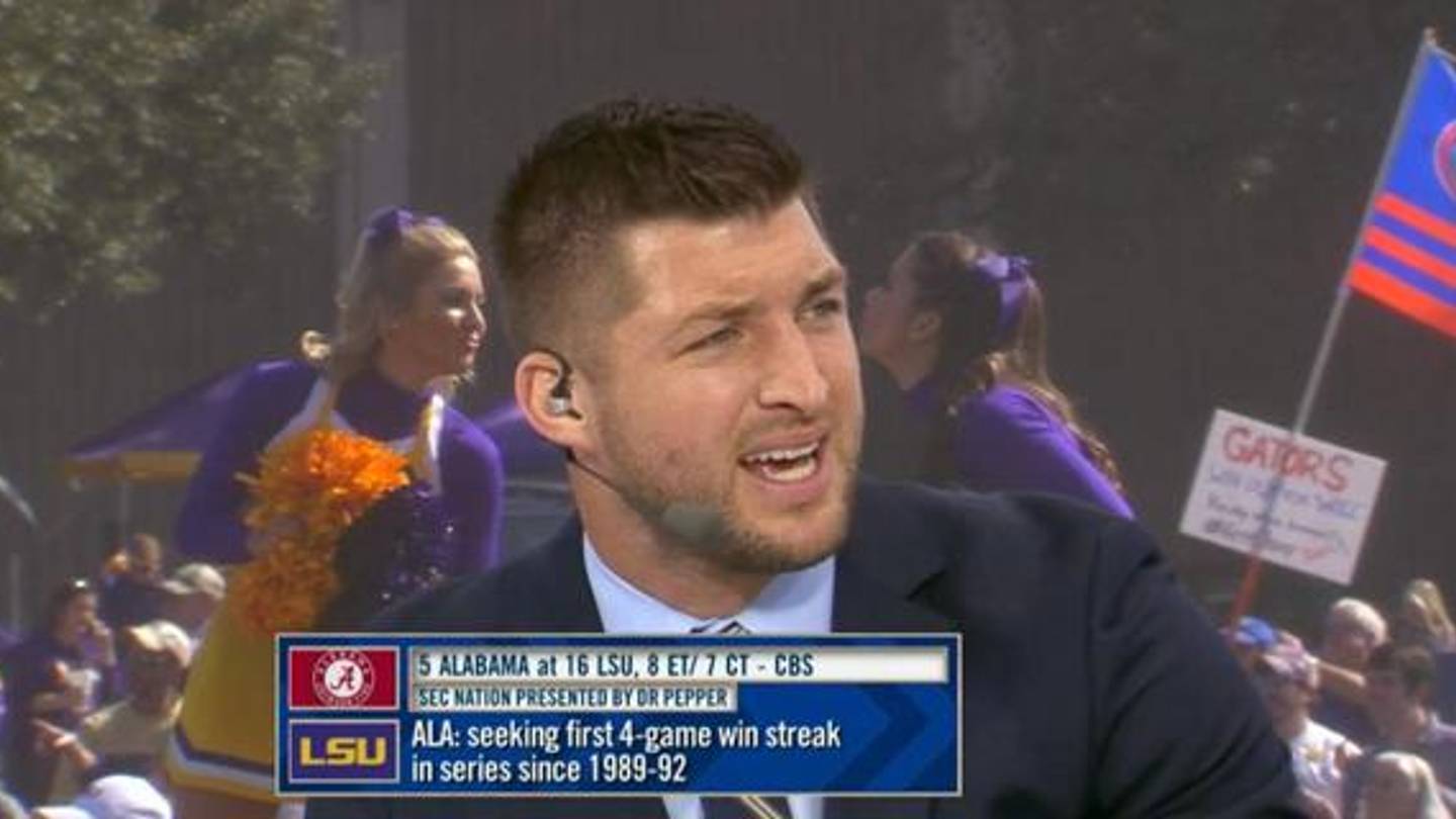 Tim Tebow kissed by LSU Tigers cheerleaders on ESPN's SEC Nation ...