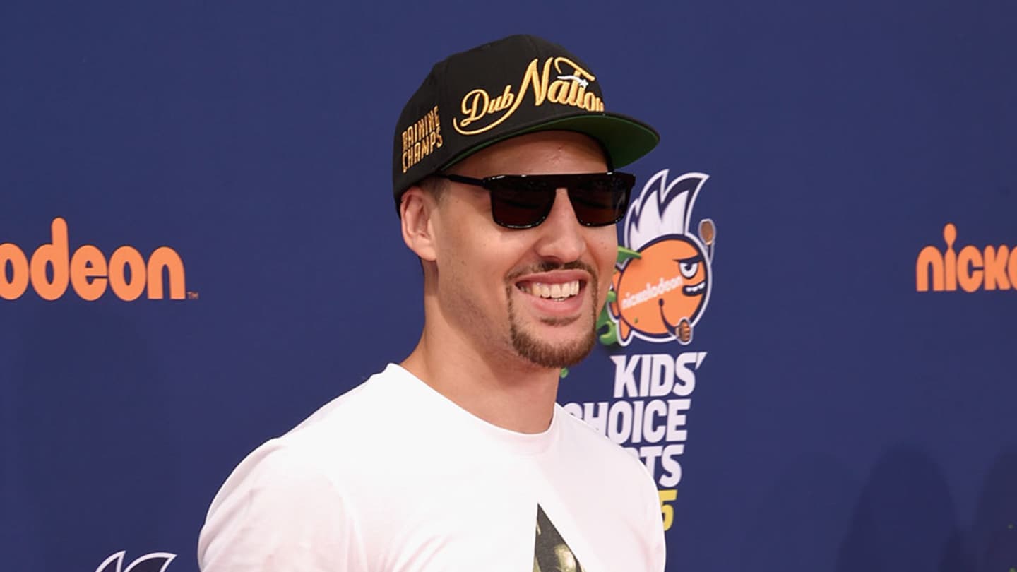 Video: Klay Thompson makes half court shot while riding a bike - Sports ...