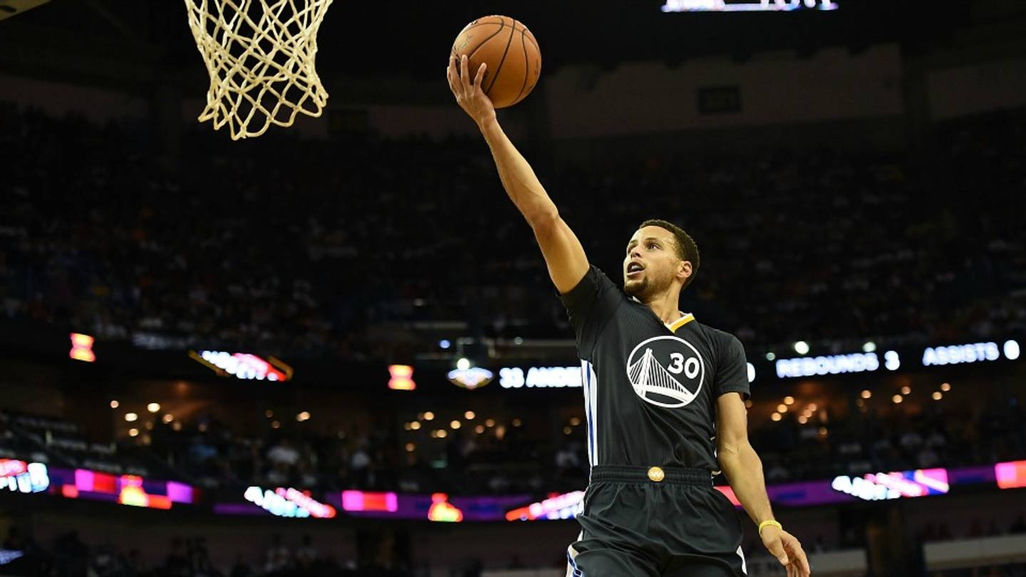 Golden State Warriors’ Stephen Curry puts on a zebra mask - Sports ...