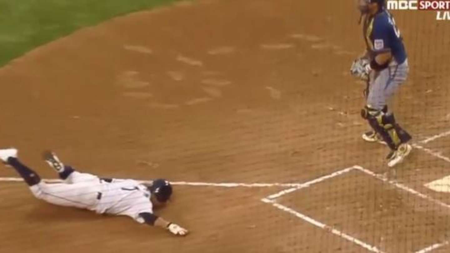 KBO player tries, fails to slide into home - Sports Illustrated
