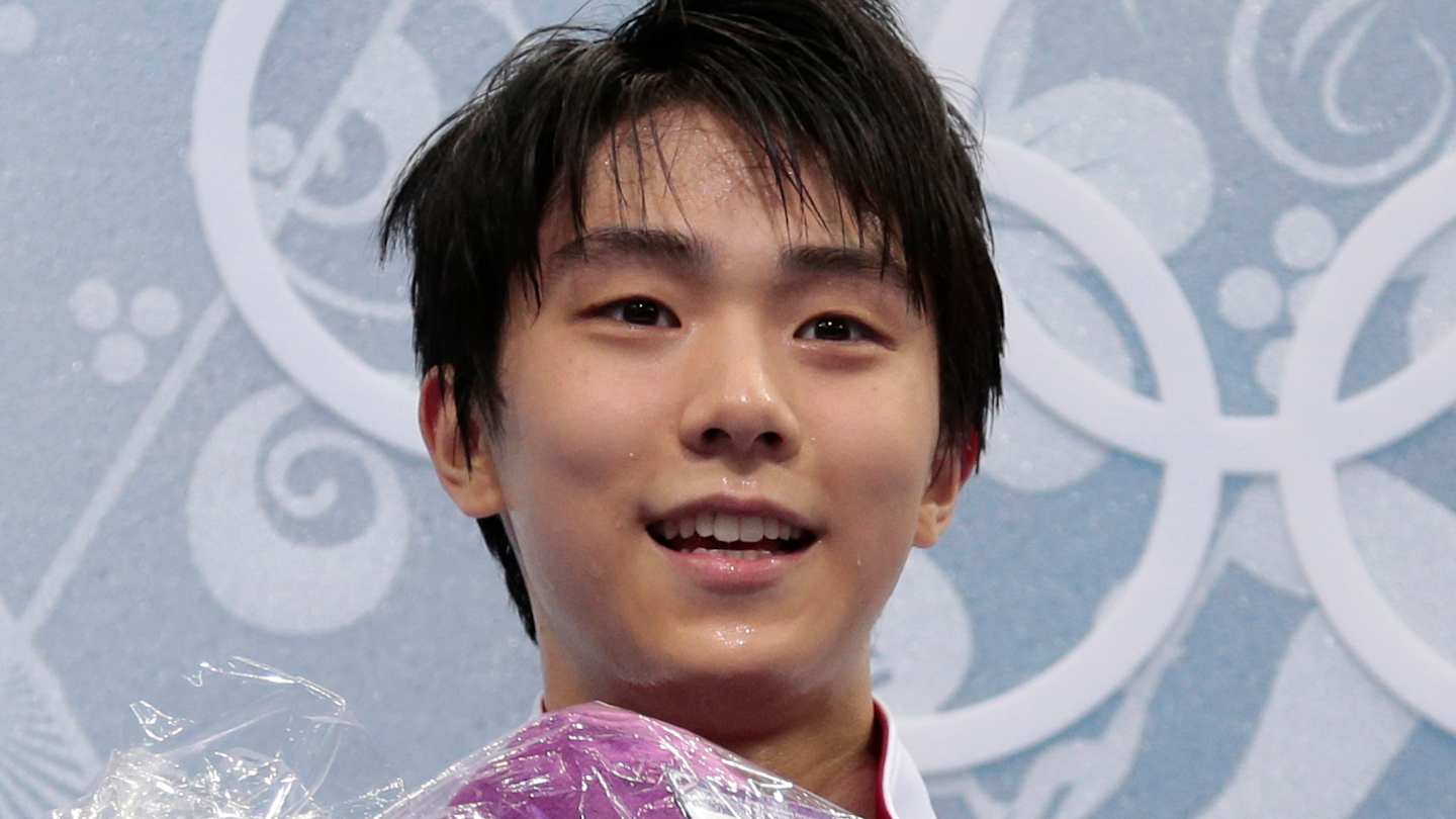 Japan celebrates Hanyu's history-making gold medal - Sports Illustrated