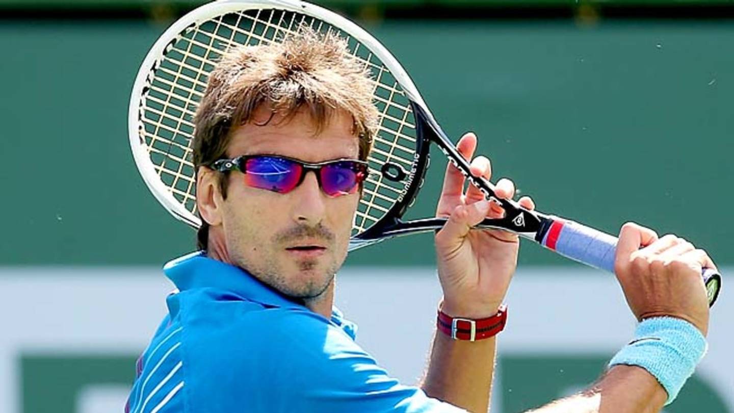 Tommy Robredo beats Kevin Anderson to win Grand Prix Hassan II - Sports ...