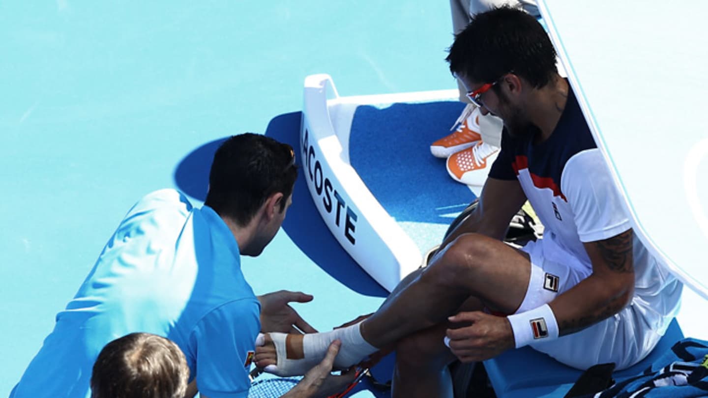 Tipsarevic's retirement sends Almagro to quarters - Sports Illustrated