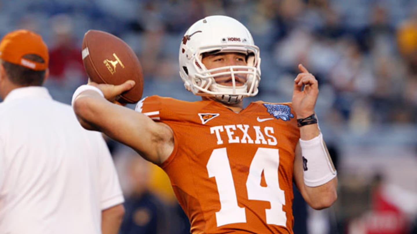 Texas quarterback David Ash (head) out for second half against Kansas ...