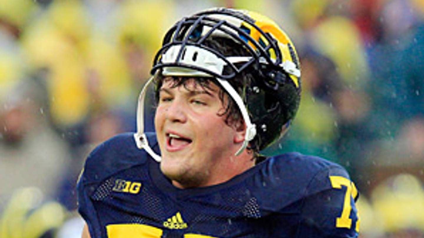 Michigan OT Lewan putting NFL draft on hold - Sports Illustrated
