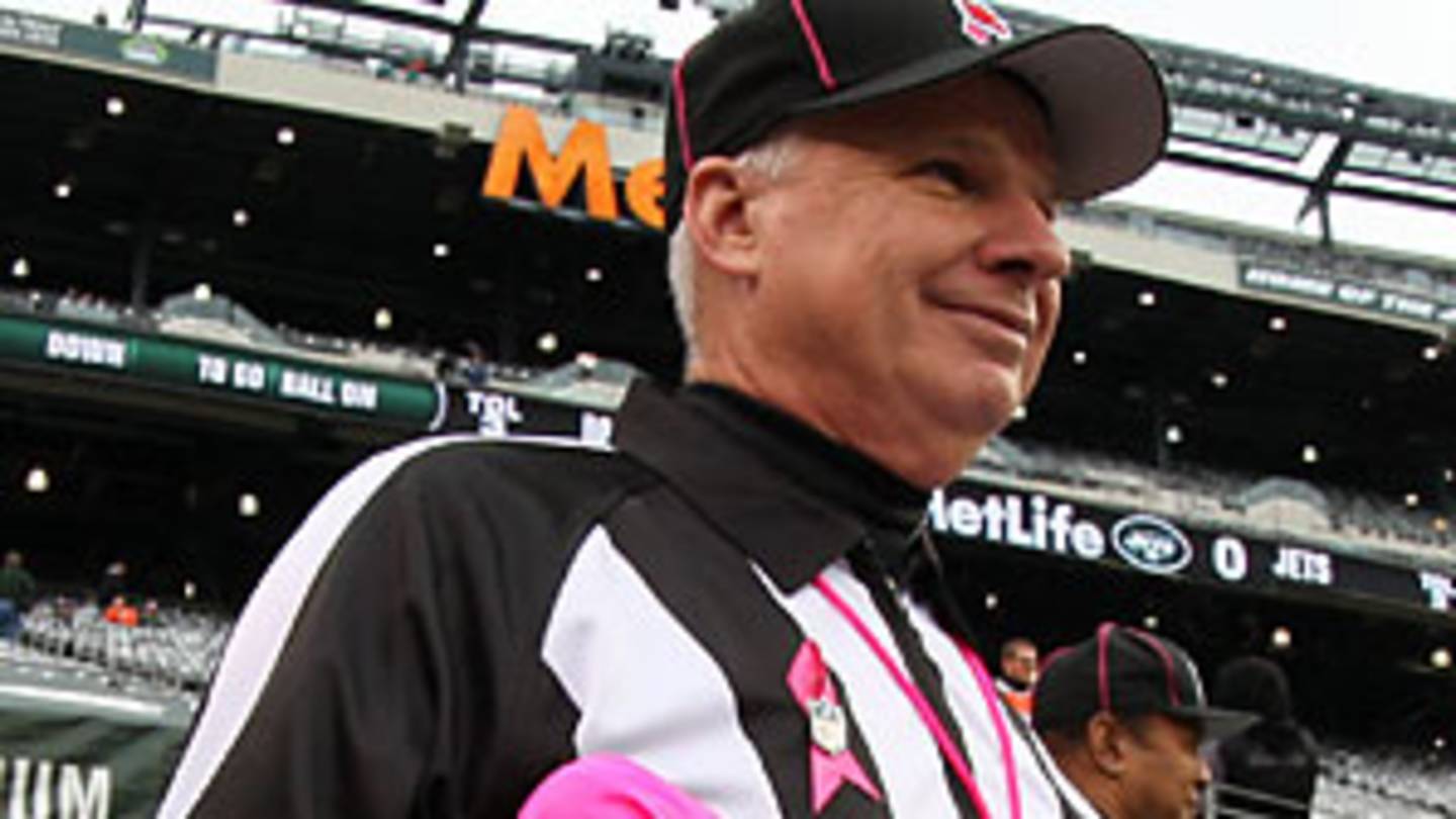 Fan, 11, presents Goodell with pink penalty flags - Sports Illustrated