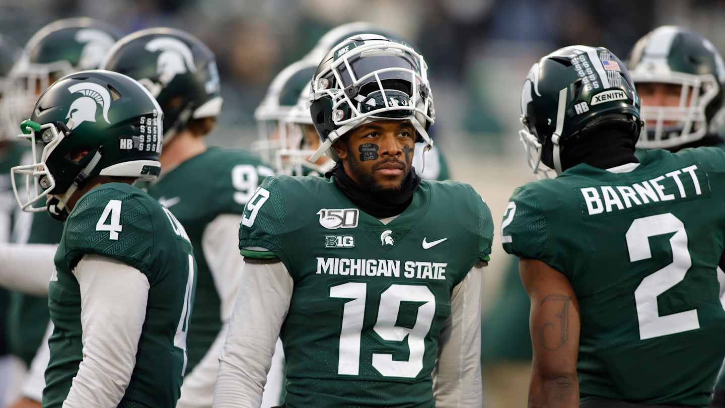 Michigan State's Josh Butler brings dogs on Senior Day after parents ...