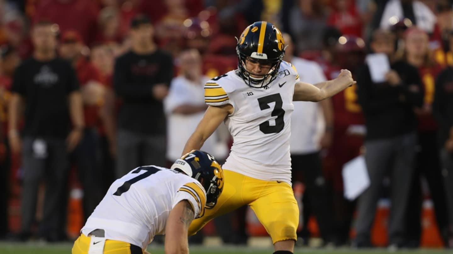 Duncan, Linderbaum Are AP All-Americans - Sports Illustrated Iowa ...