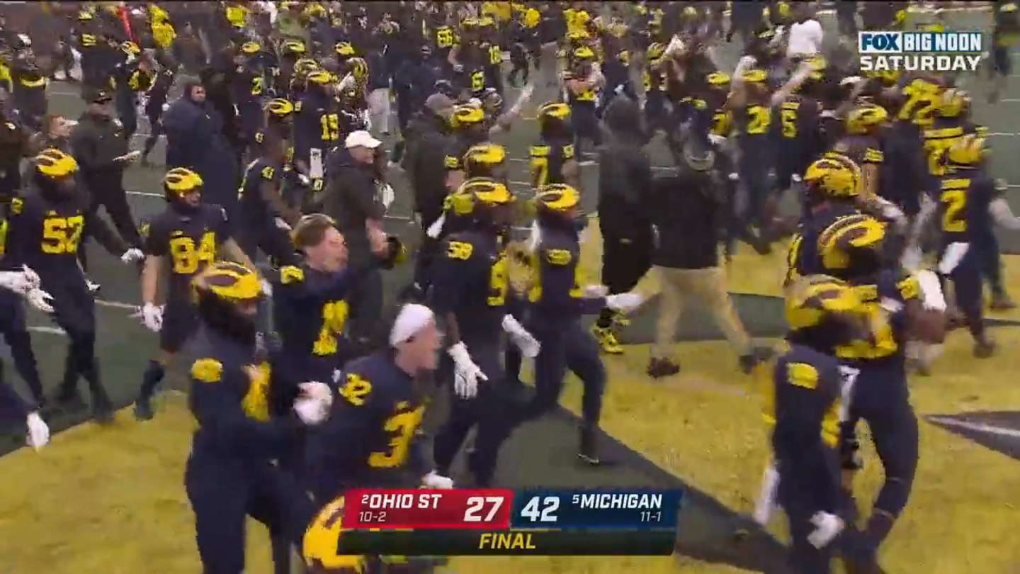 Michigan Fans Storm Field After Victory Over Ohio State - Sports ...