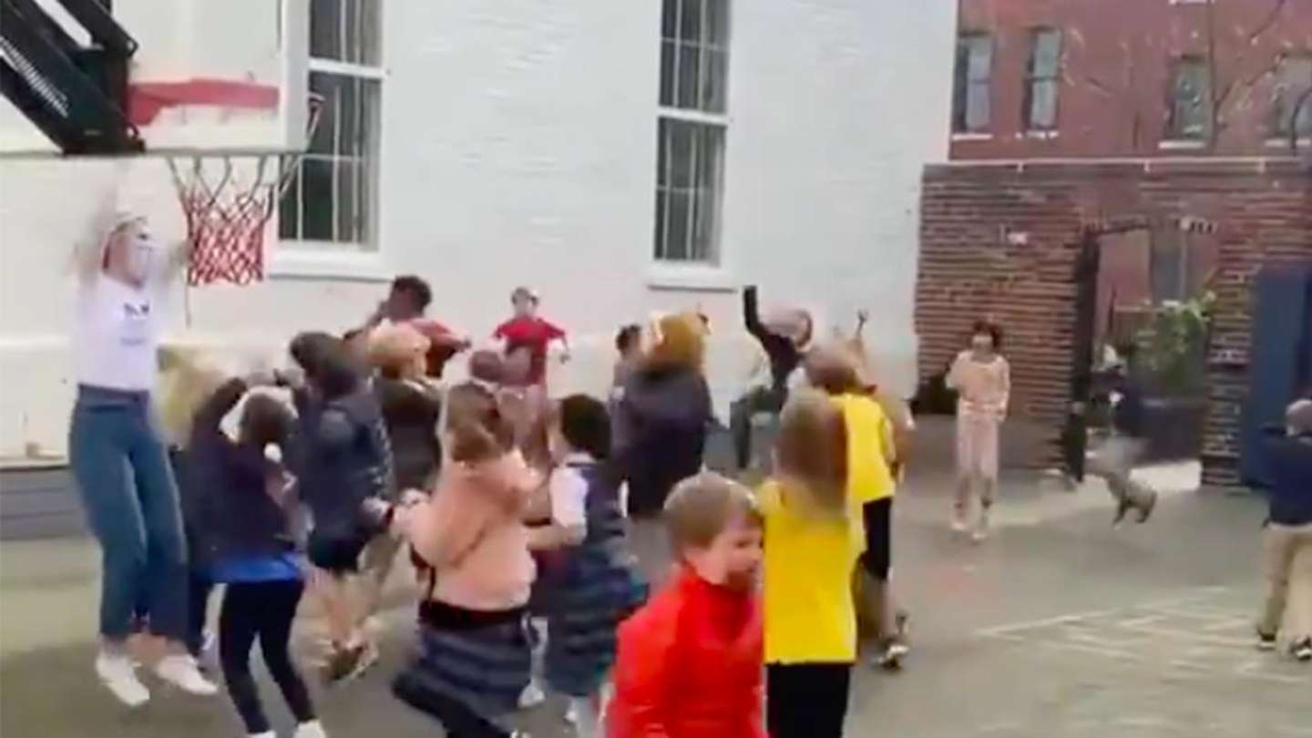 Third graders rejoice as teacher hits full-court shot to win hot cocoa ...