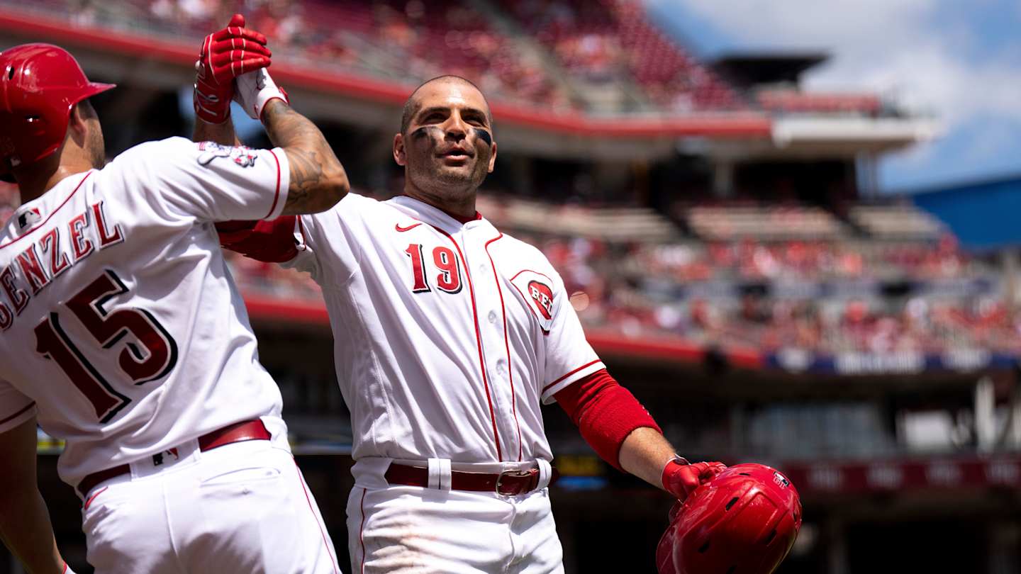 Cincinnati Reds Fan Goes Viral For Cheering on Joey Votto at Her First ...
