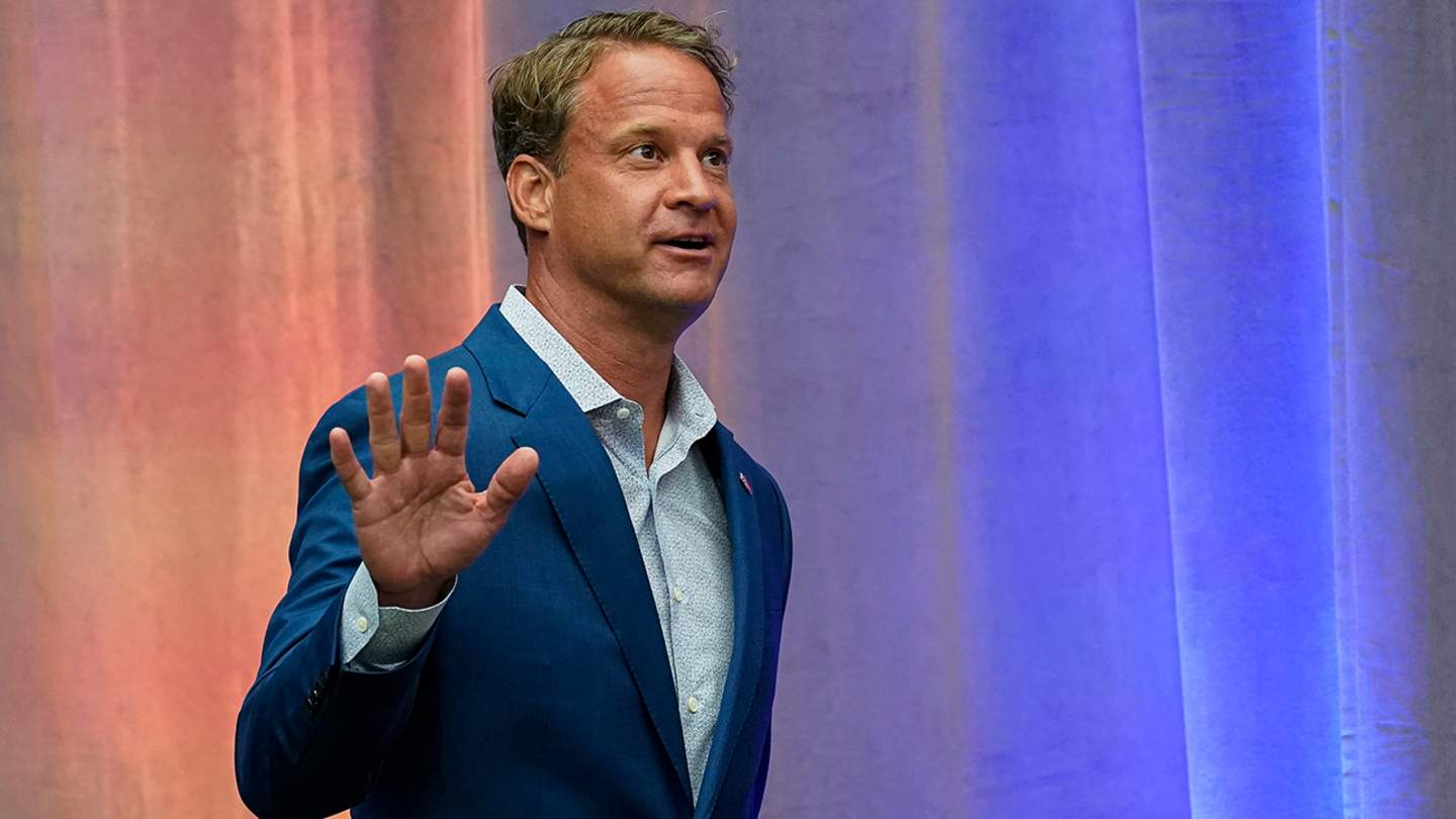 Lane Kiffin Signs Mustard Bottle, Homage to Tennessee–Ole Miss Showdown ...