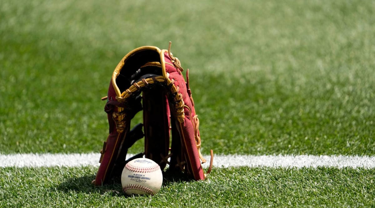 Watch: Figure Skater Kim Ye-lim Throws an Unbelievable First Pitch ...