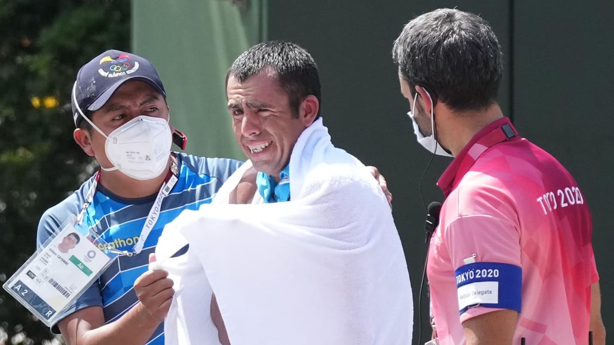 Emotional Scene as Last-Place Race Walker Crosses Finish Line in Te...